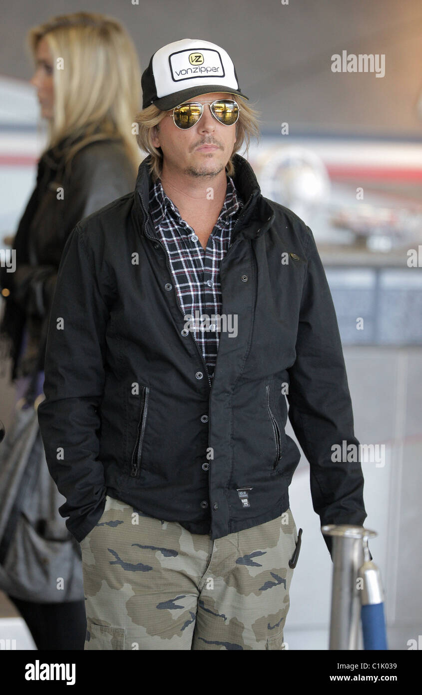 David Spade and his girlfriend Jillian Grace arrive at LAX to catch an ...