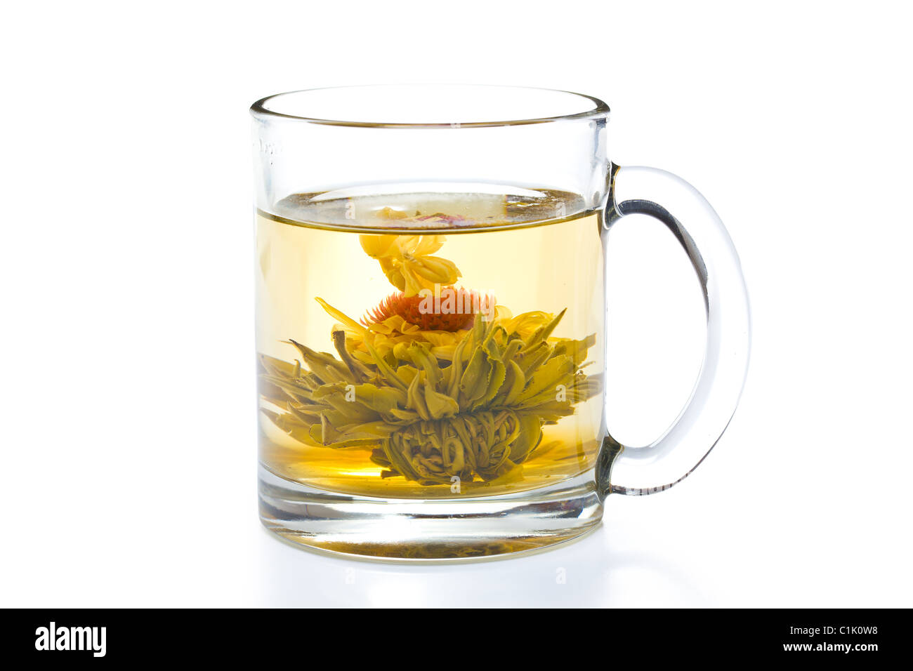tea with flower on white background Stock Photo - Alamy