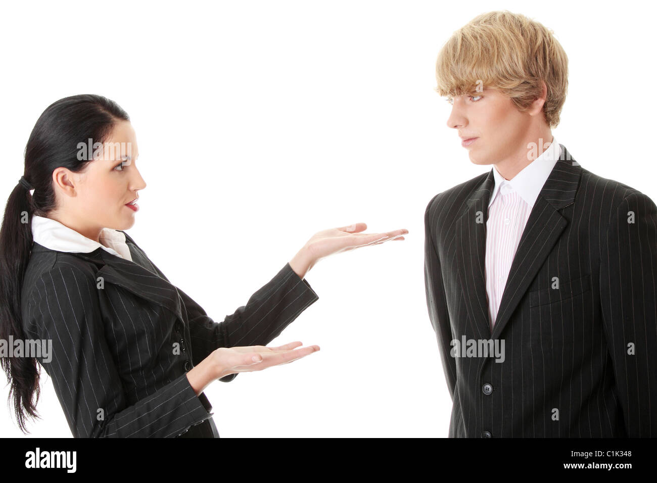 Work Colleagues arguing (woman shouting on man), isolated on white ...