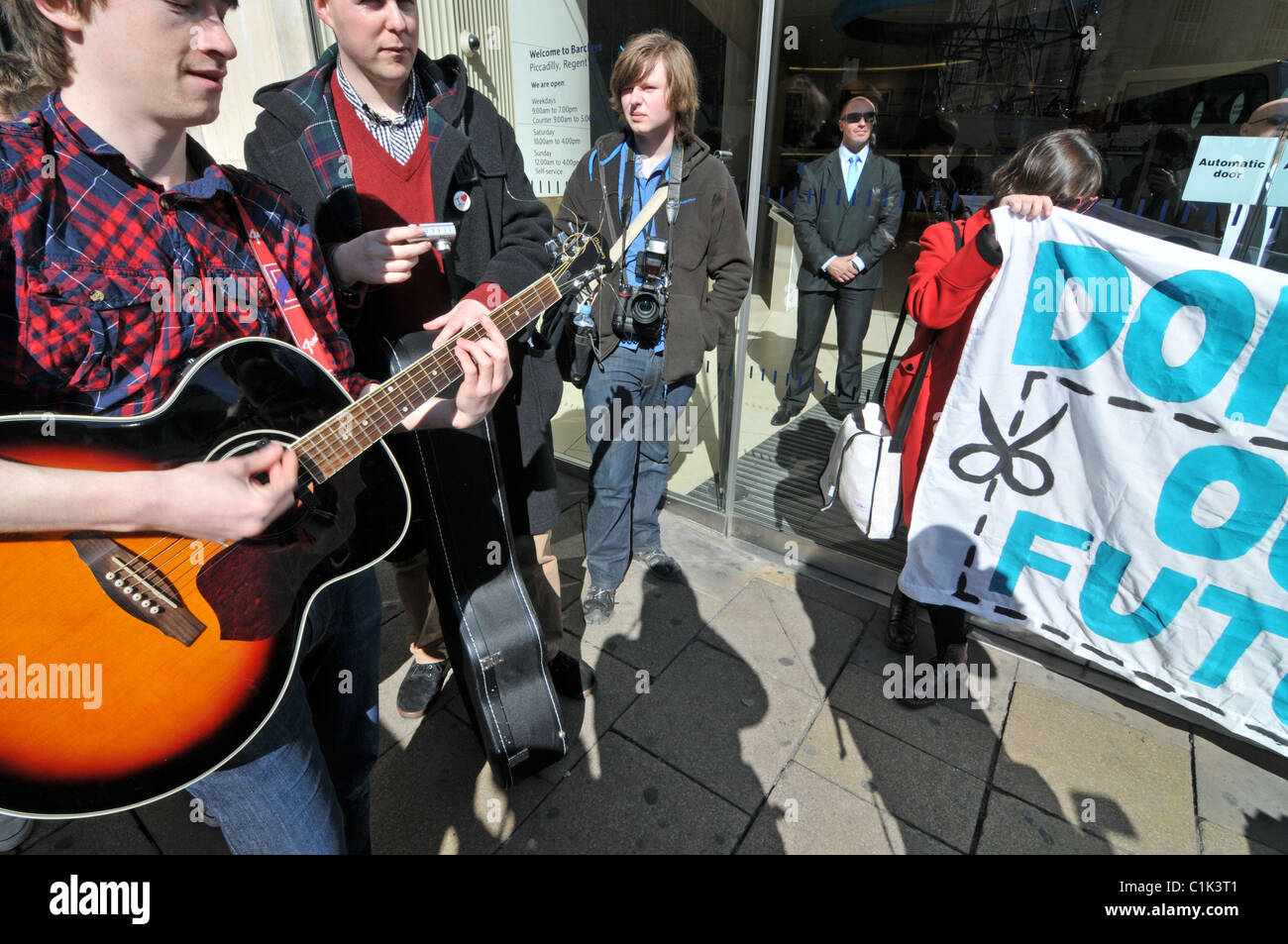 Ukuncut Barclays Bank action Rage against the cash machine activists ...