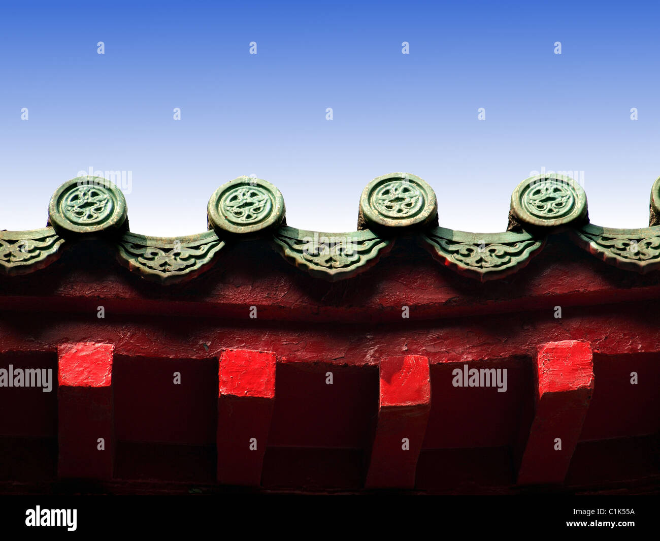 Green glazed decorated bricks on the eaves of a traditional Chinese ...