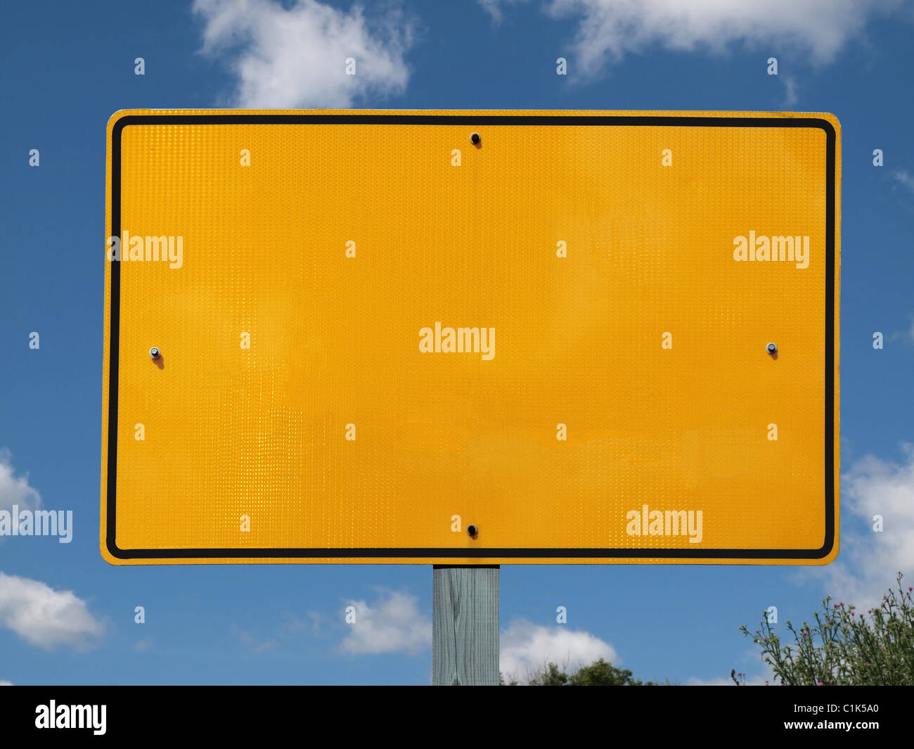 Blank reflective yellow highway message sign with puffy clouds Stock ...