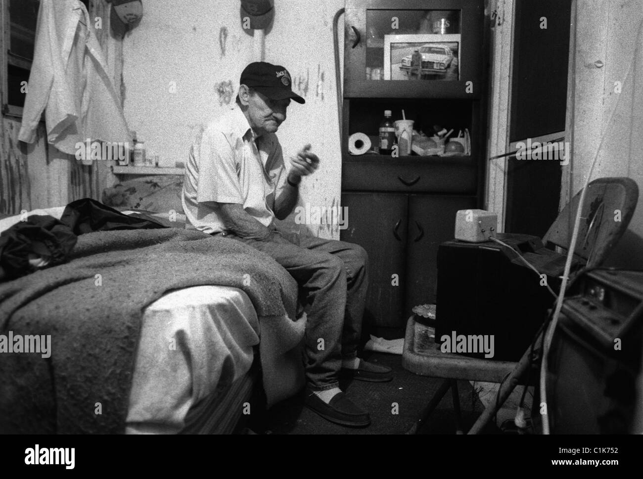Grandpa sits in his shack smoking cigarettes poverty retirement ...