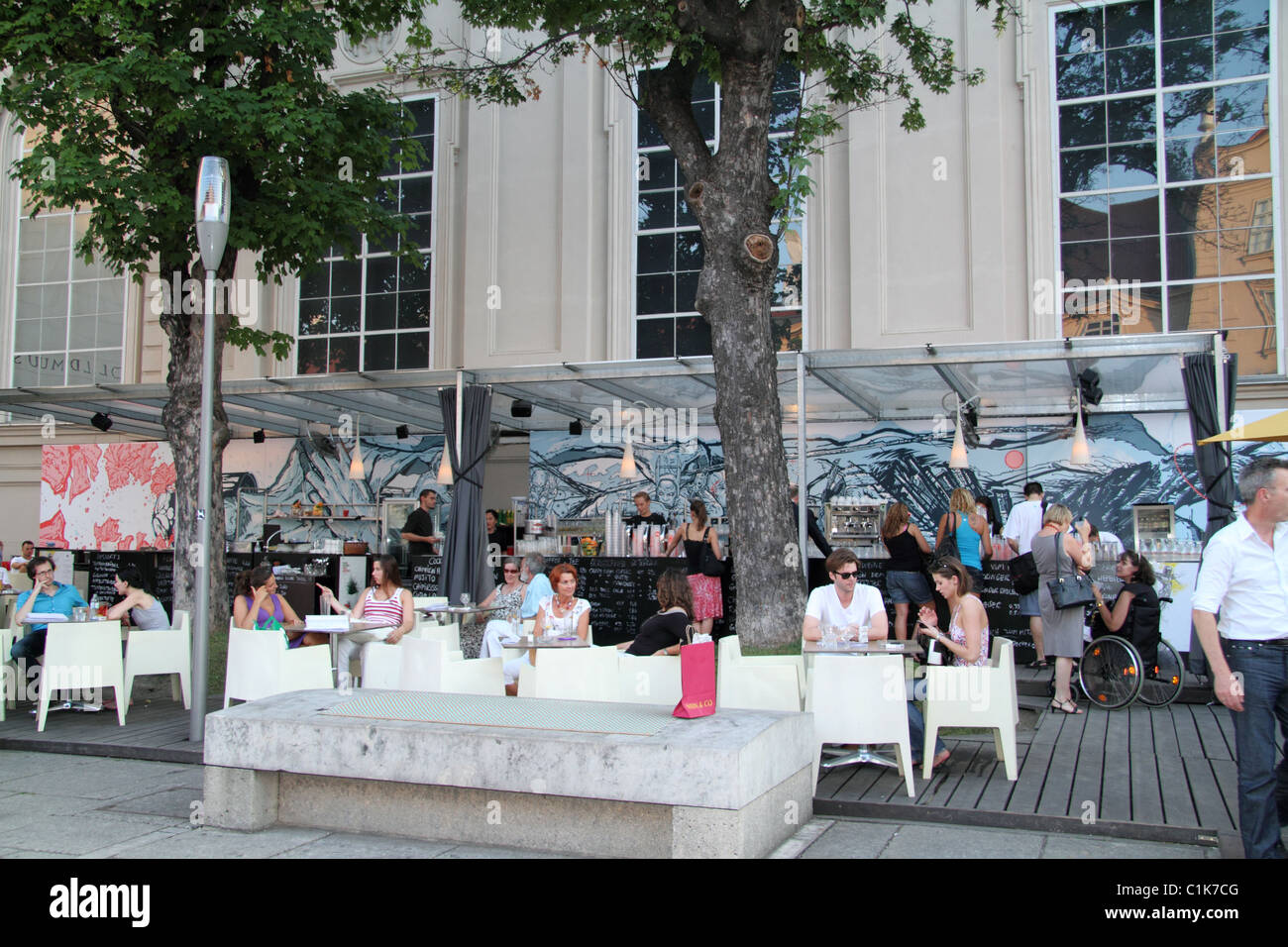 People relaxing outside Museums Quartier Stock Photo - Alamy