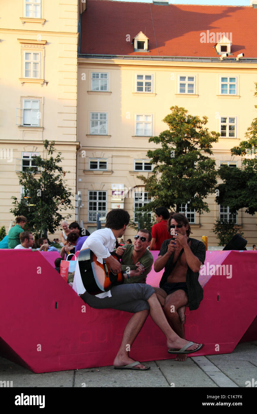 People relaxing outside Museums Quartier Stock Photo - Alamy
