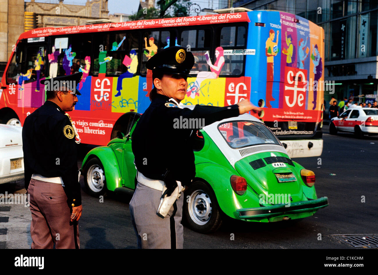 Mexico, Federal District, Mexico City, police woman officer regulating ...