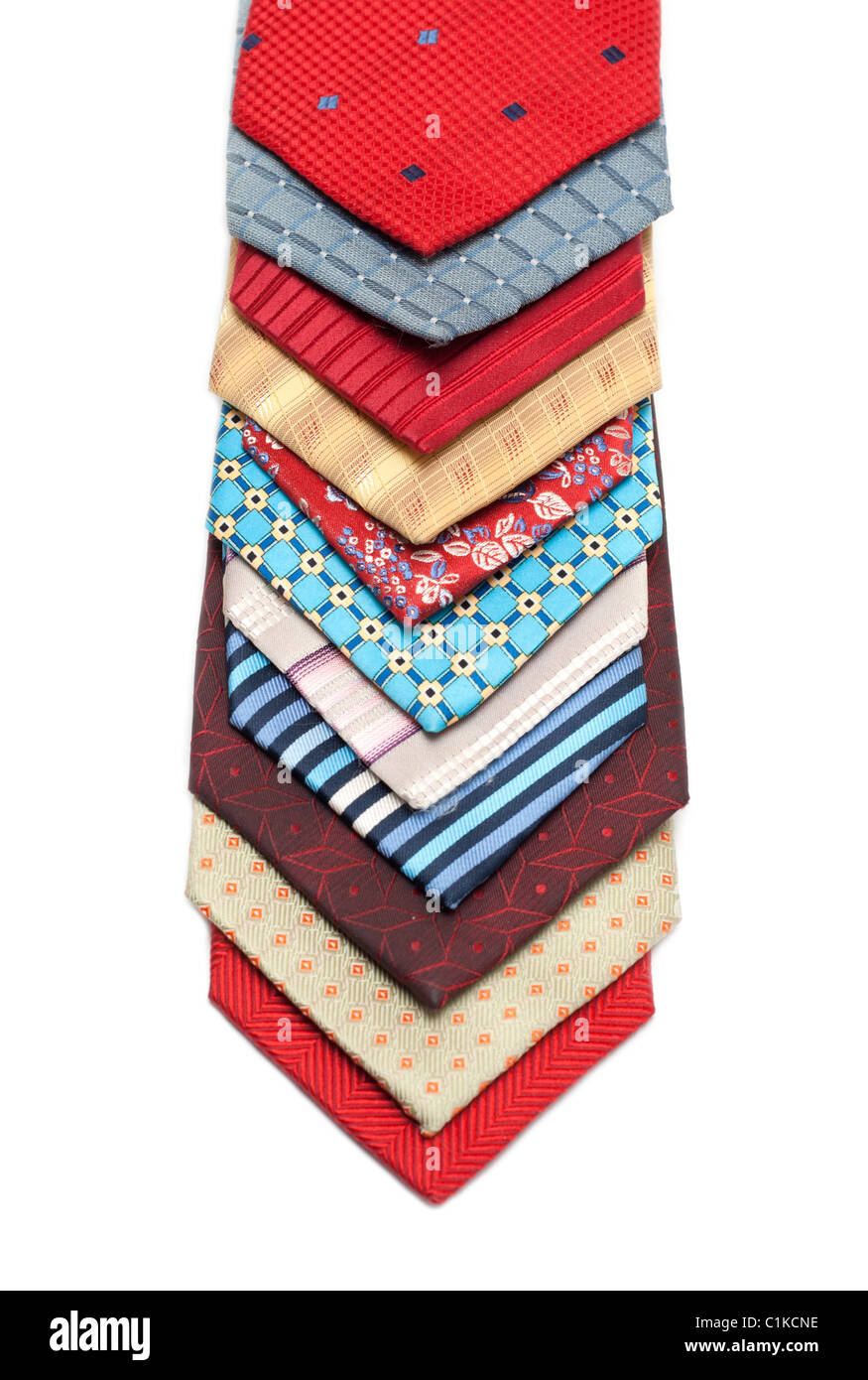 Varicoloured ties lies friend on friend on white background Stock Photo ...