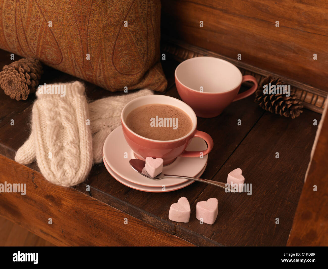 Hot Chocolate and Mittens on Bench Stock Photo - Alamy