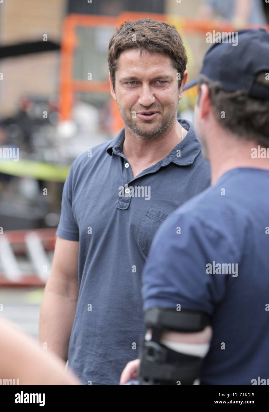 Gerard Butler on the set of 'The Bounty Hunter' filming a fight scene ...