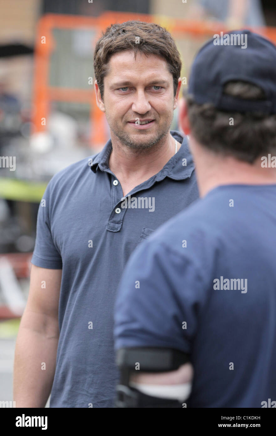 Gerard Butler on the set of 'The Bounty Hunter' filming a fight scene ...