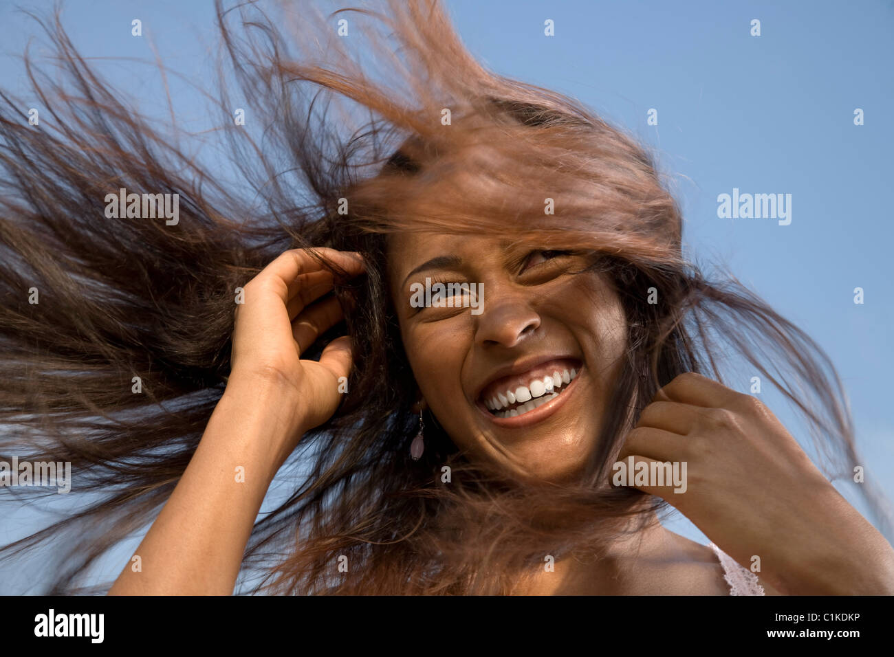 Blow young woman blowing 30 35 hi-res stock photography and images - Alamy