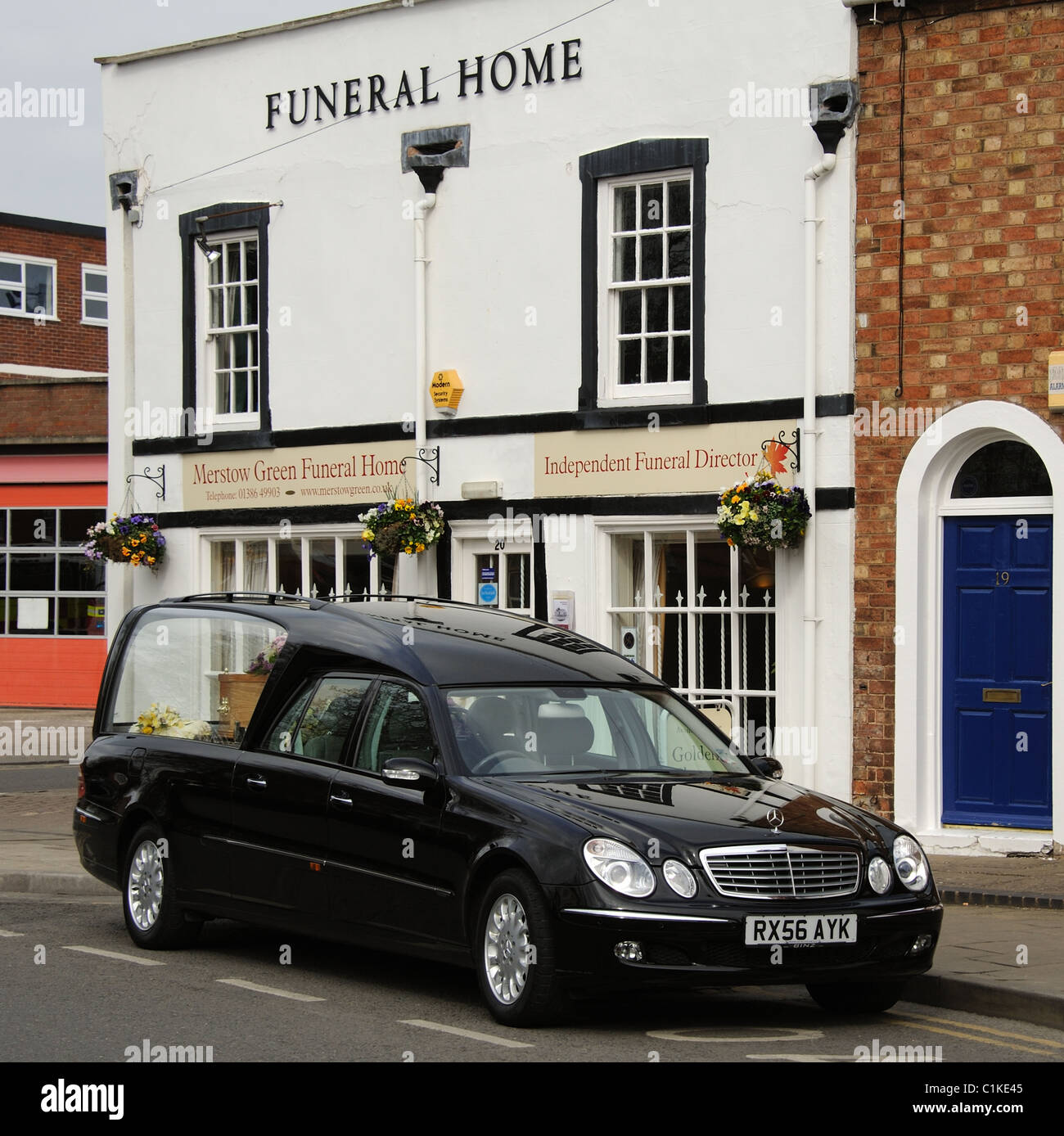 Hearse and coffin outside a funeral home in Worcestershire England ...