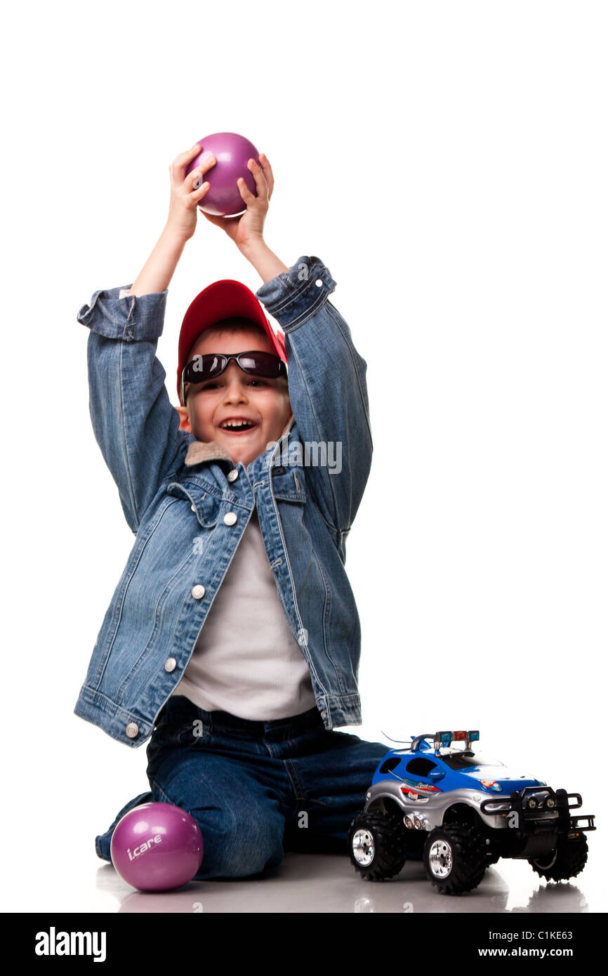 Cute boy playing isolated on white Stock Photo - Alamy