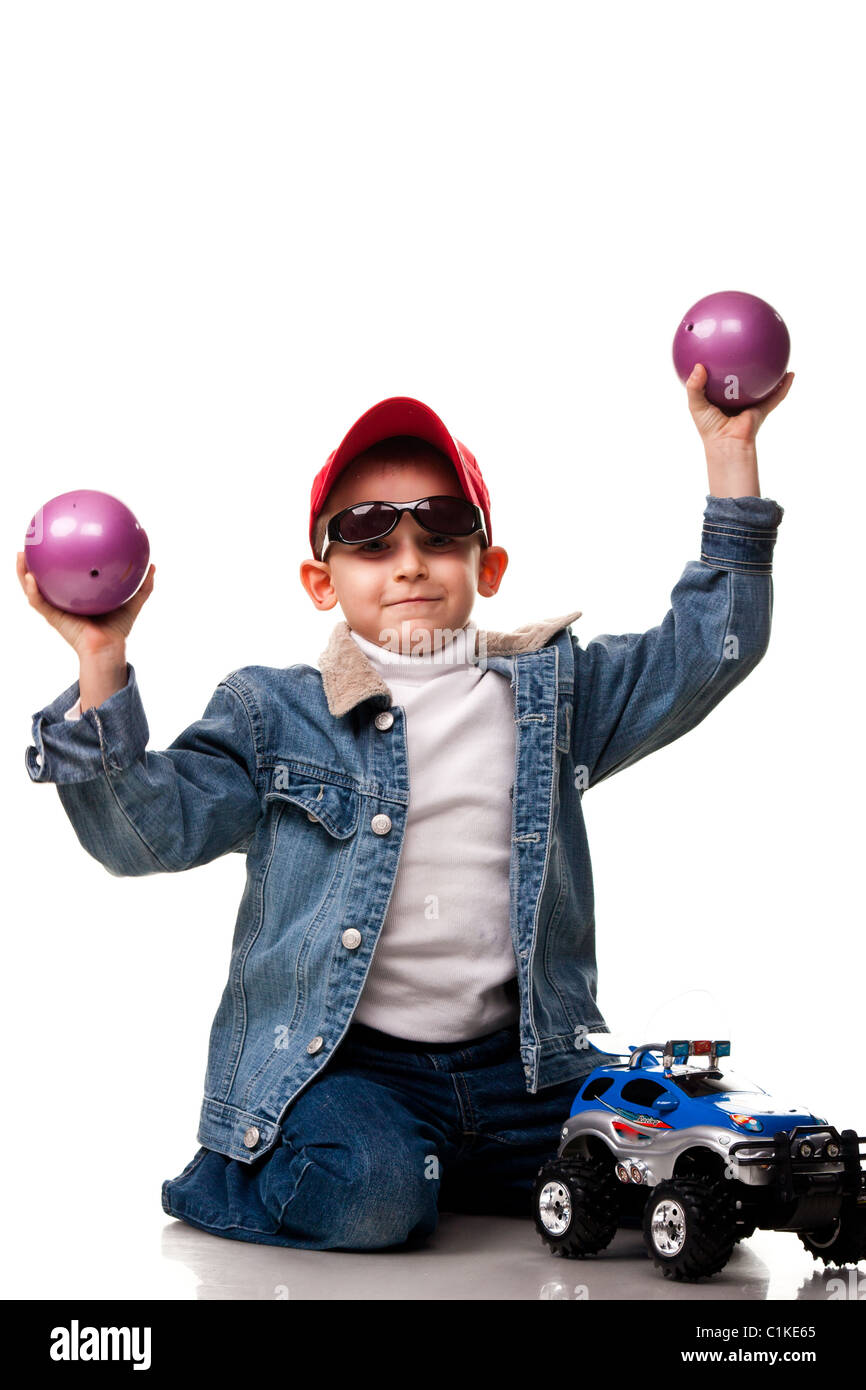 Cute boy playing isolated on white Stock Photo - Alamy