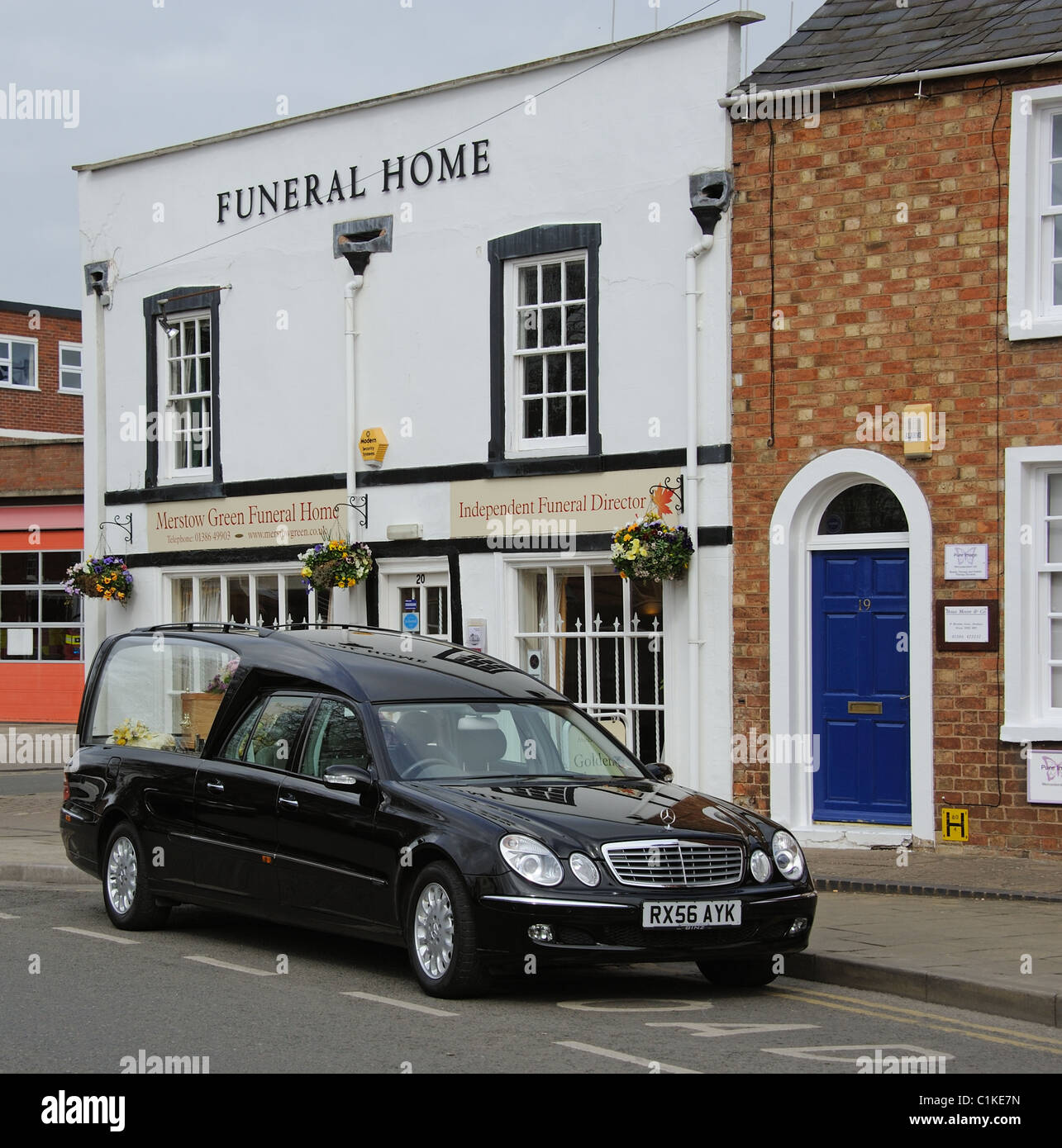 Hearse and coffin outside a funeral home in Worcestershire England ...