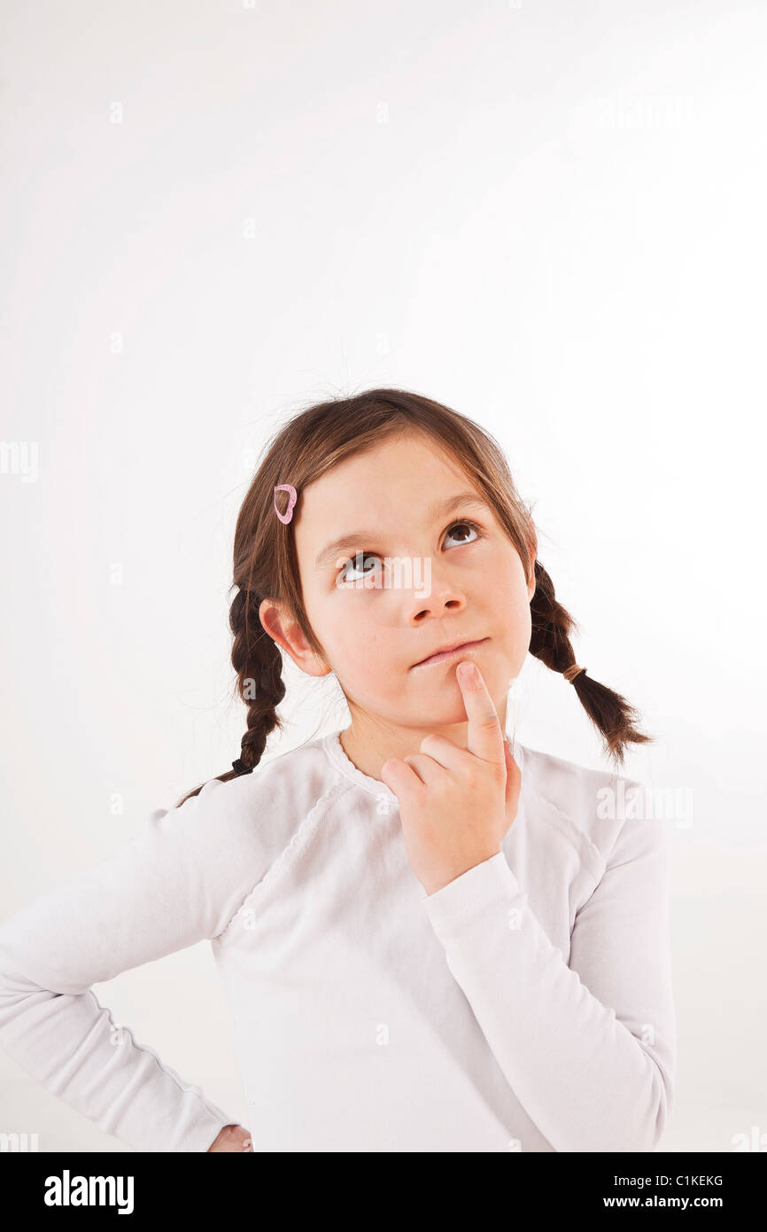 Portrait of Girl Thinking Stock Photo - Alamy