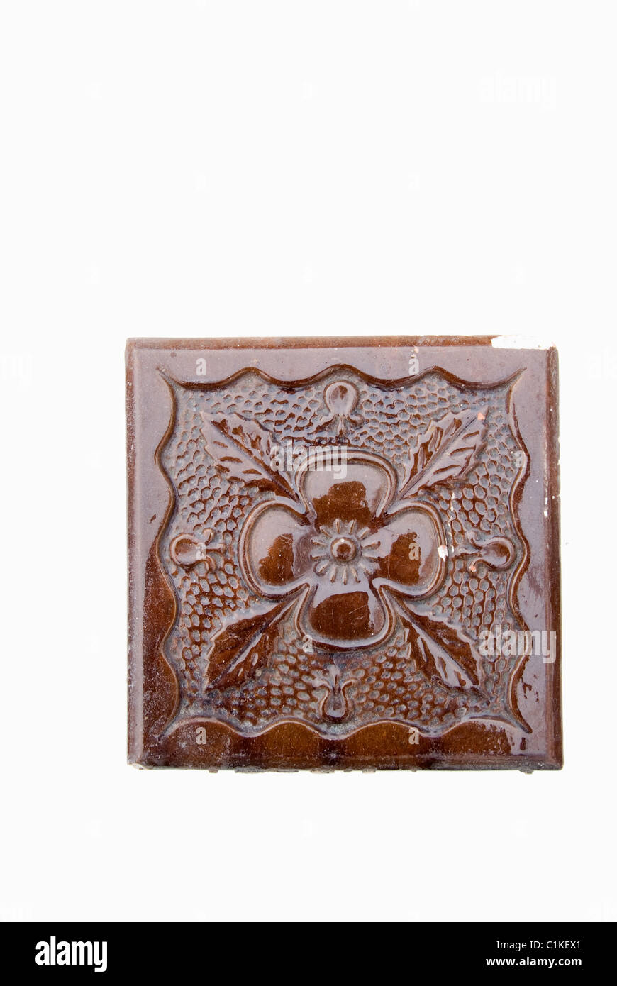 old historical and ornamental furnace tile Stock Photo - Alamy