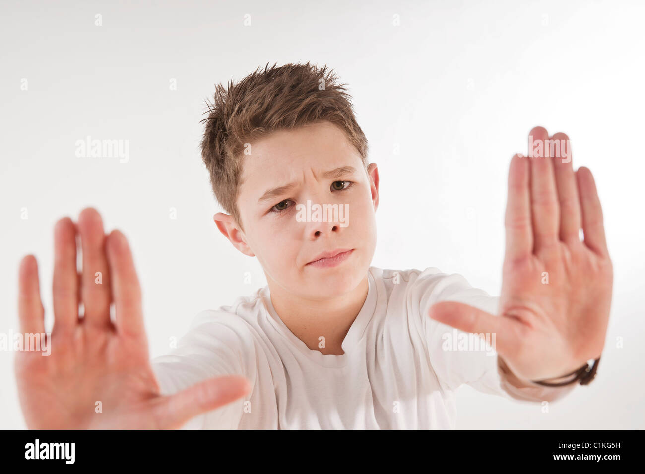 Boy with Hands up Stock Photo - Alamy