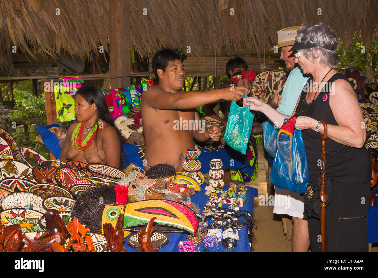 Tourist buying crafts of the Native Indian Embera Tribe, Embera Village ...