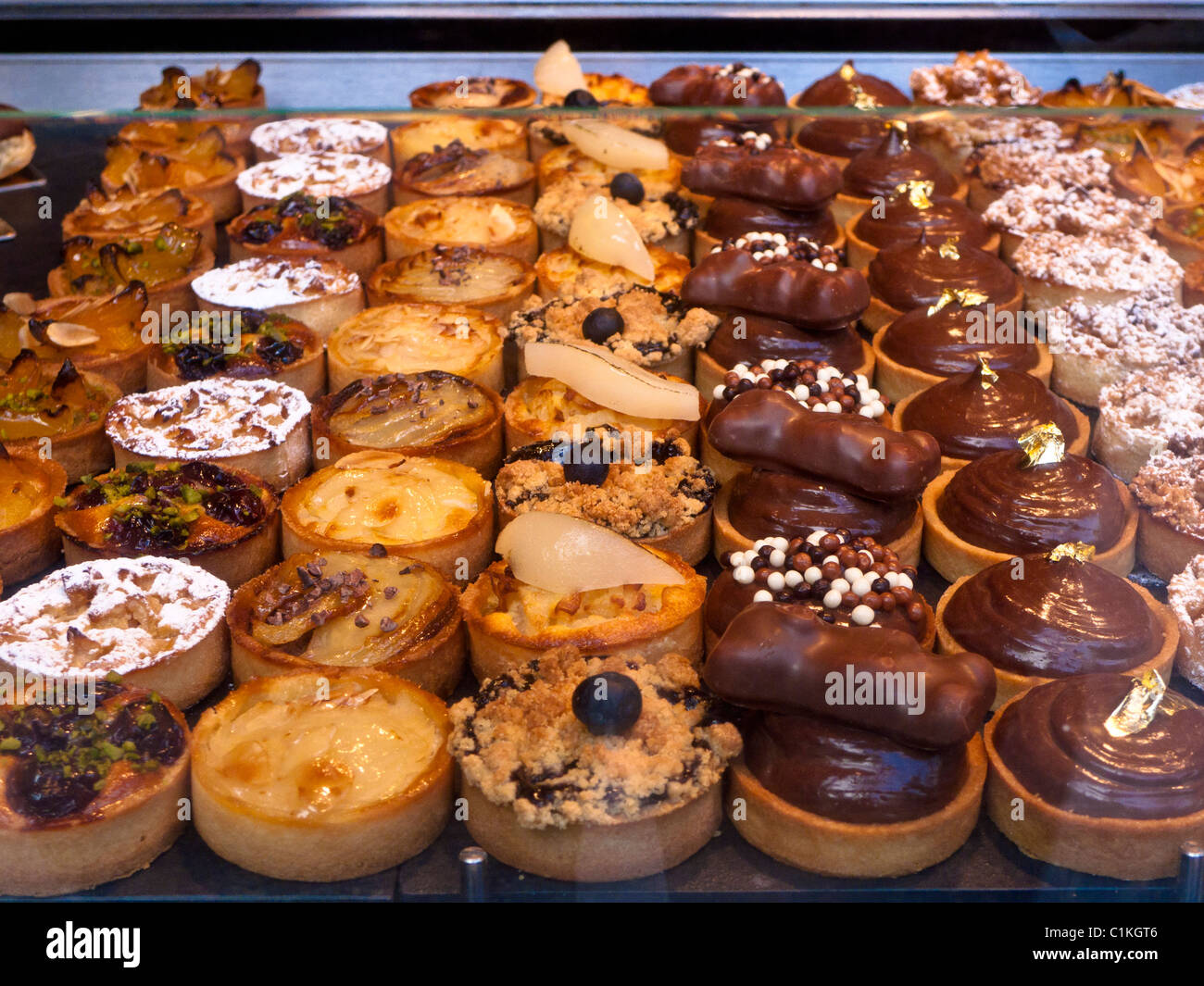 Tarts in boulangerie window, France Stock Photo - Alamy