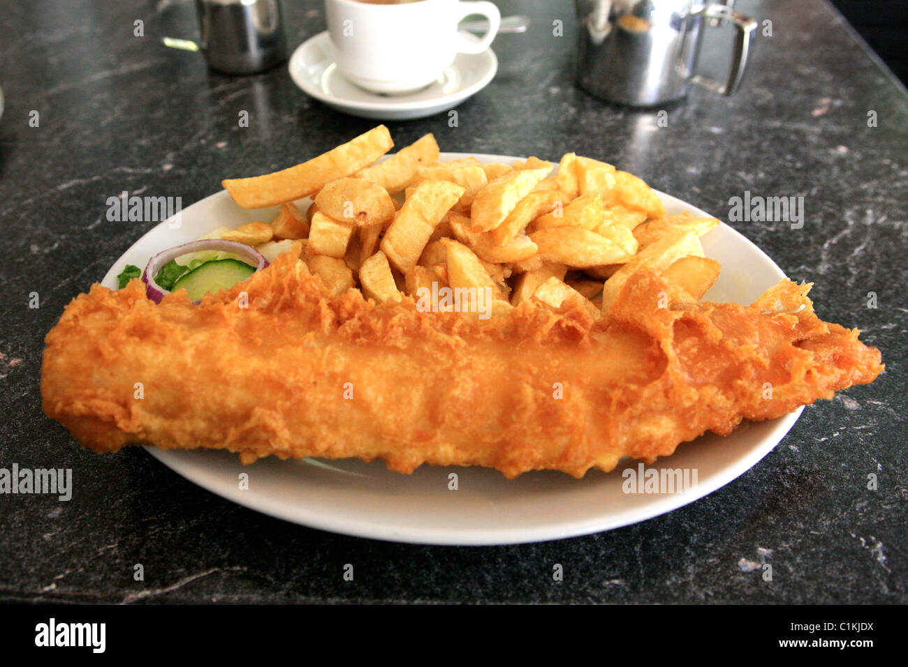 Plate of Cod and Chips in an English Fish and Chip cafe Stock Photo - Alamy