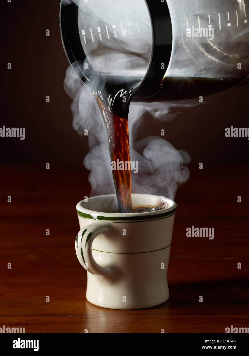 Pouring Coffee into Mug Stock Photo - Alamy