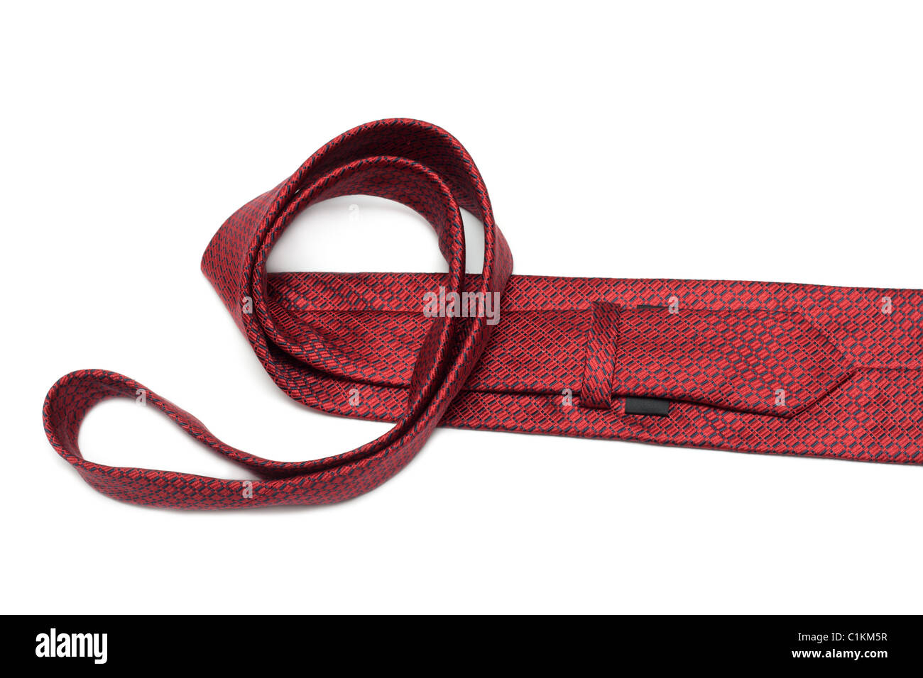 Crimson tie convolute insulated on white background Stock Photo - Alamy