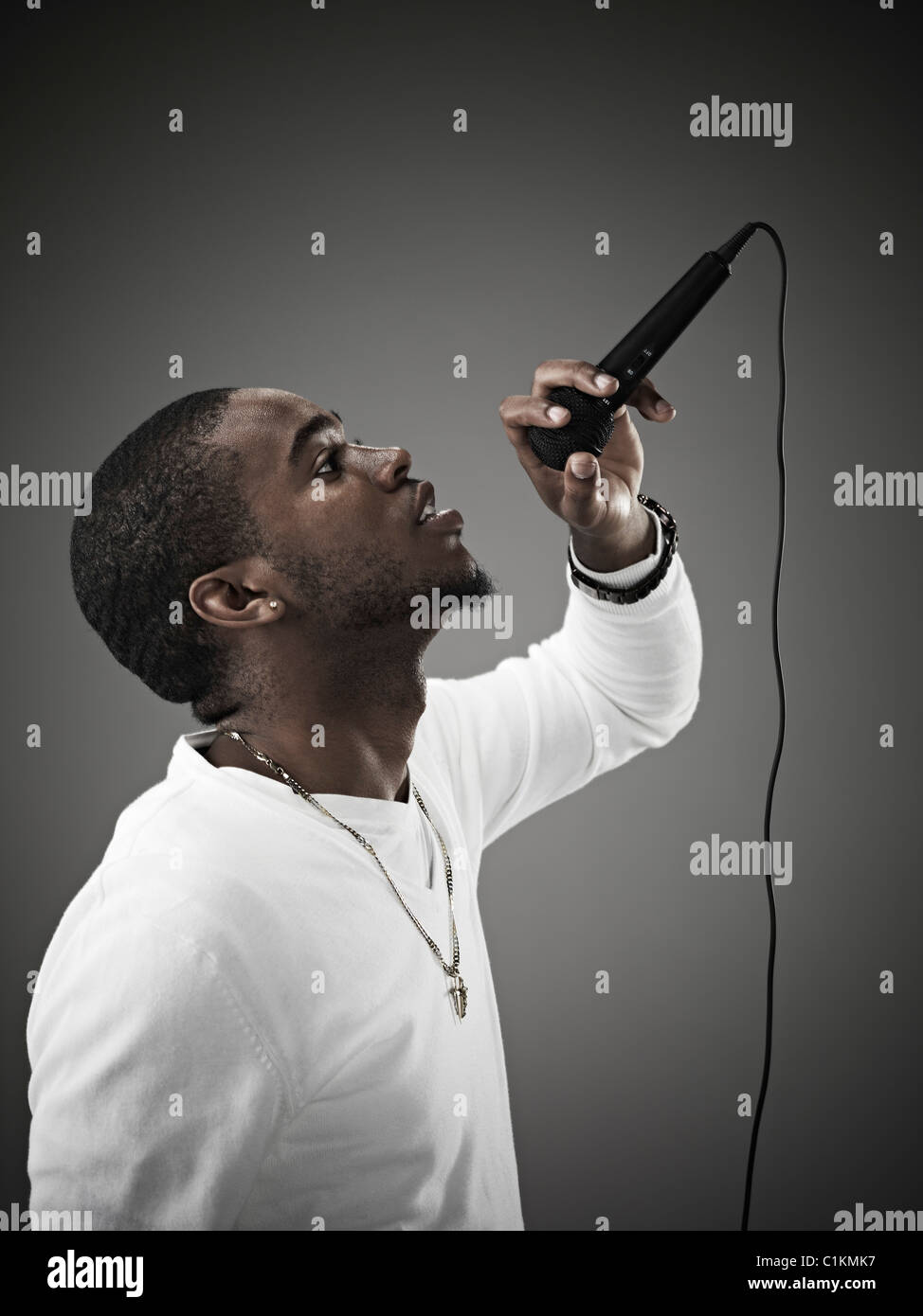 Side profile young man singing hi-res stock photography and images - Alamy