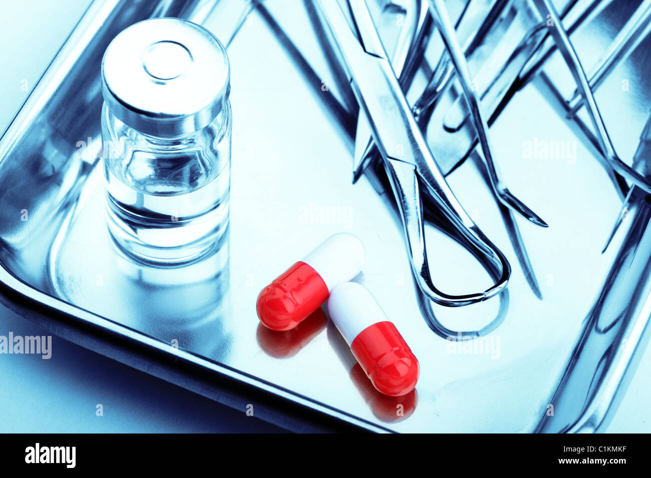 Medical instruments in a steel tray Stock Photo - Alamy