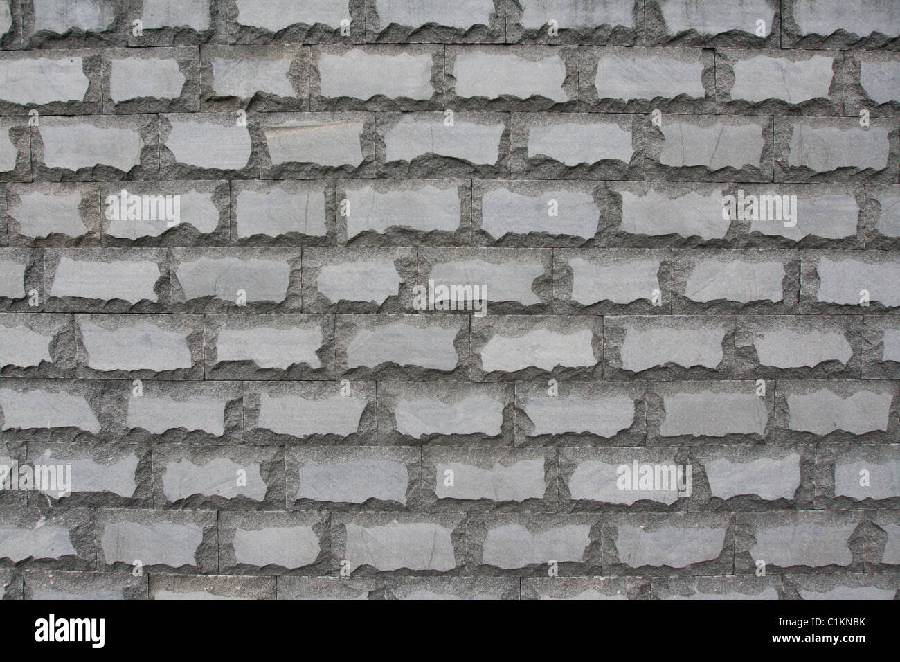 Sulfuric brick wall, marble rows Stock Photo - Alamy