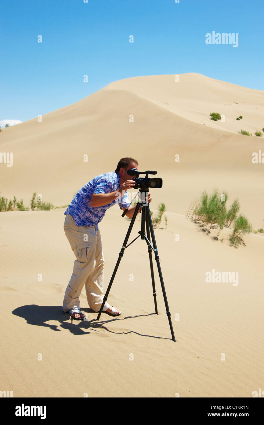 Video shooting in hot desert Stock Photo - Alamy