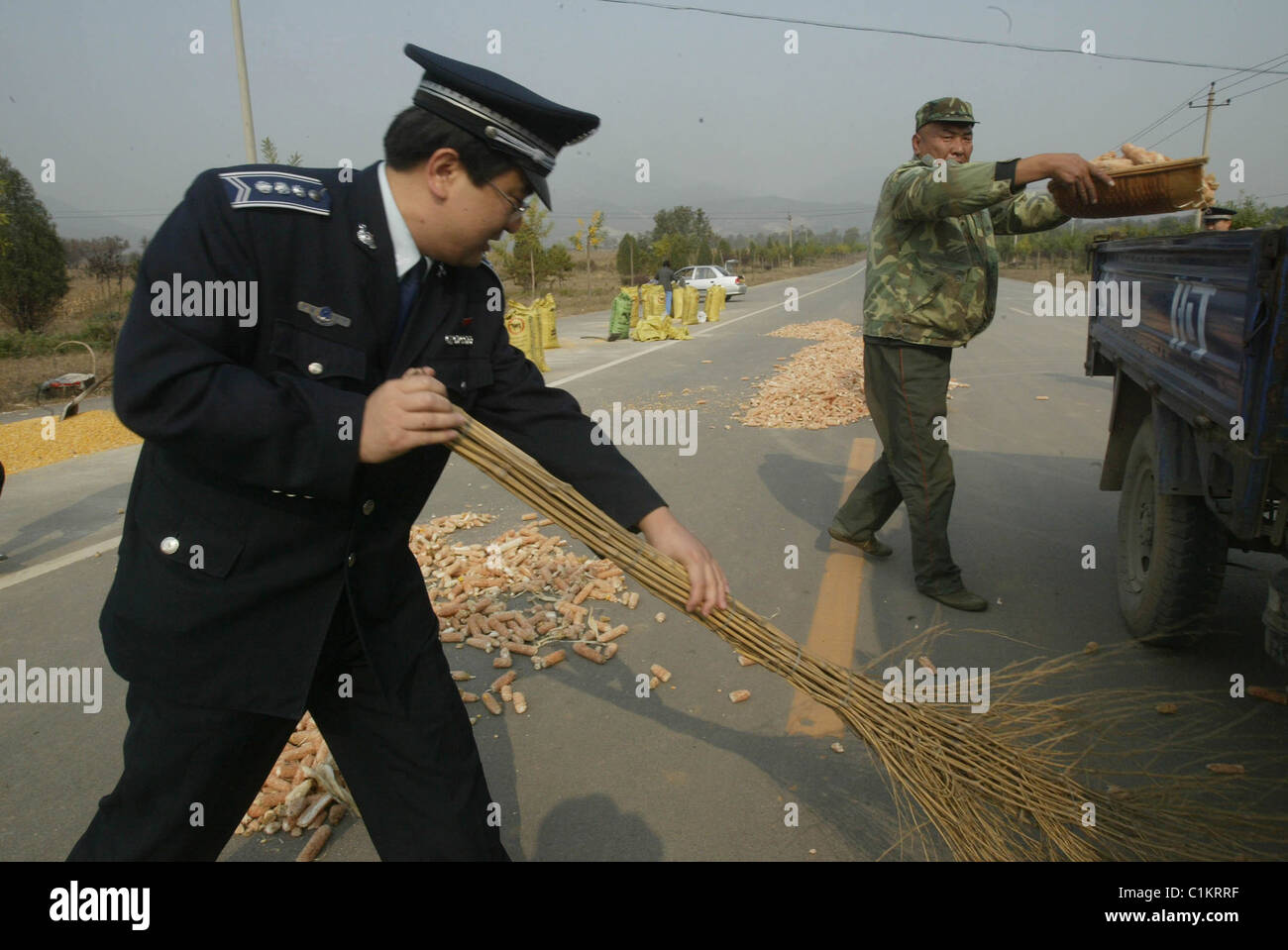CORN-Y COPS Police in Beijing, China are cracking down on corn farmers ...
