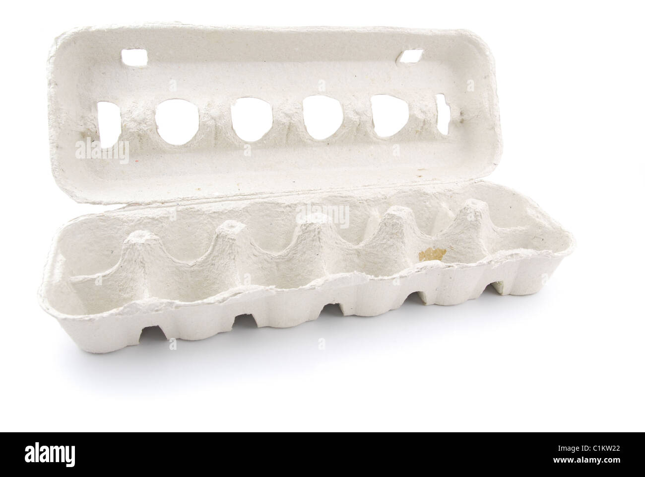 Empty eggs box on white Stock Photo - Alamy