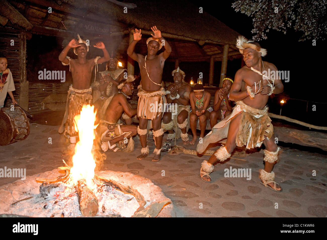 African People Dancing Around Fire