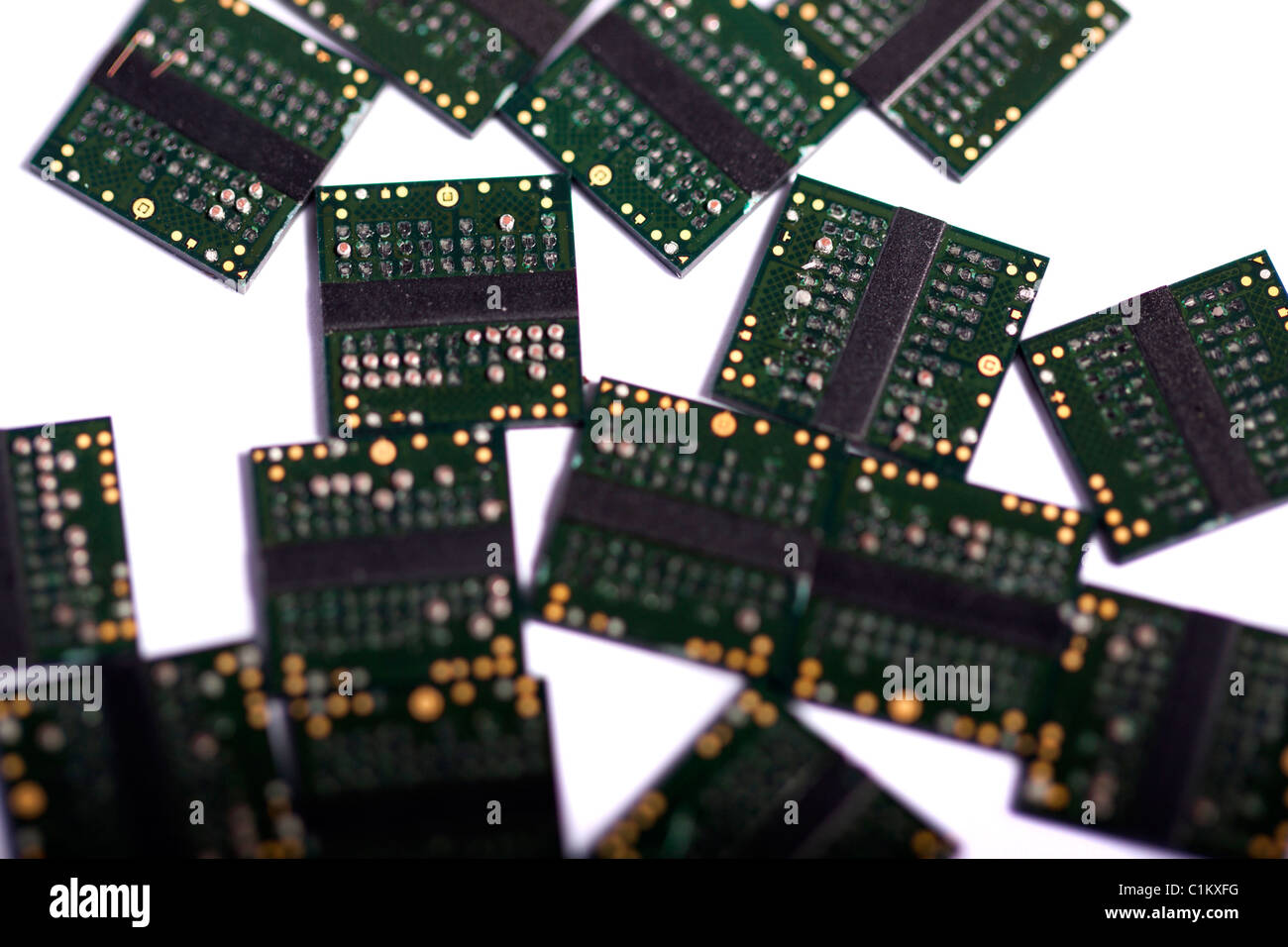 Close view of a bunch of computer memory chips isolated on a white ...