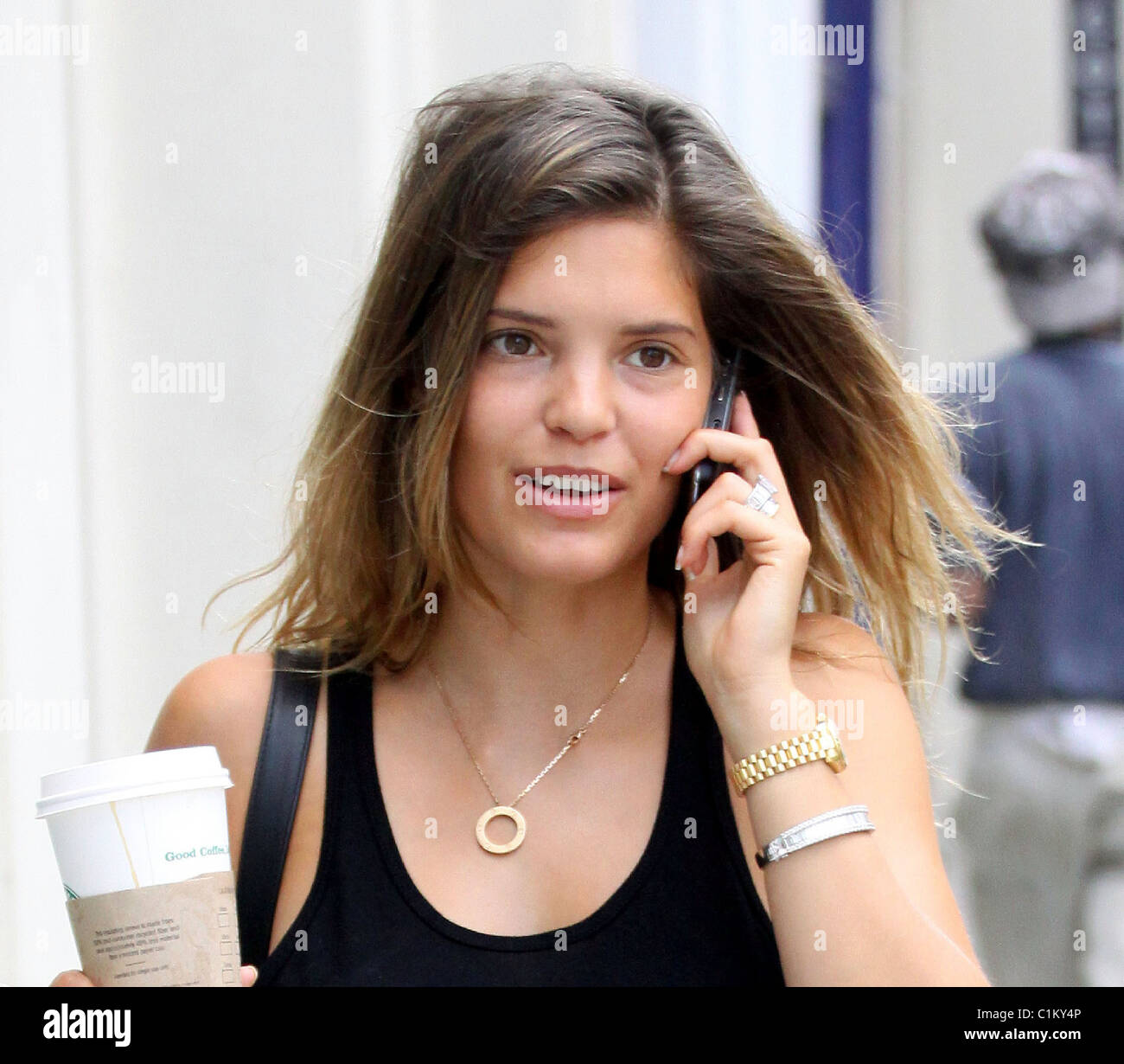 Carly Zucker chatting on her mobile phone as she runs errands in west ...