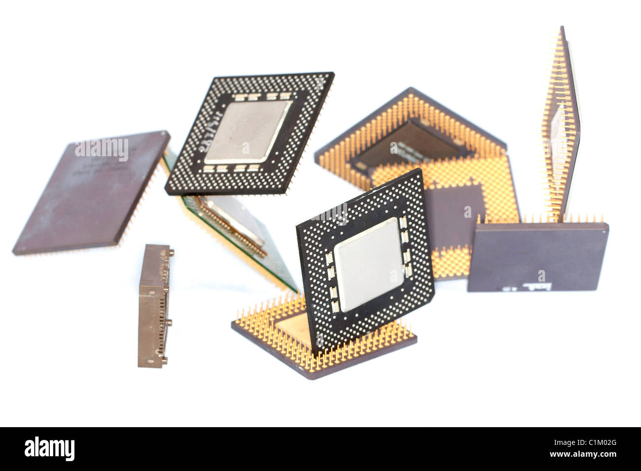 Close view detail of some computer microprocessors isolated on a white ...