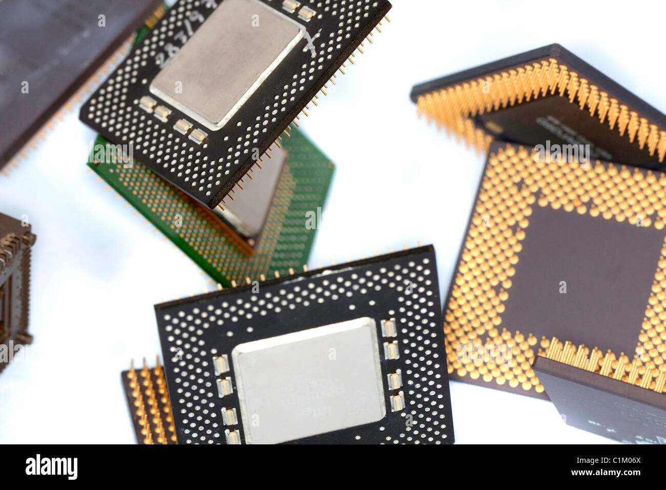 Close view detail of some computer microprocessors isolated on a white ...