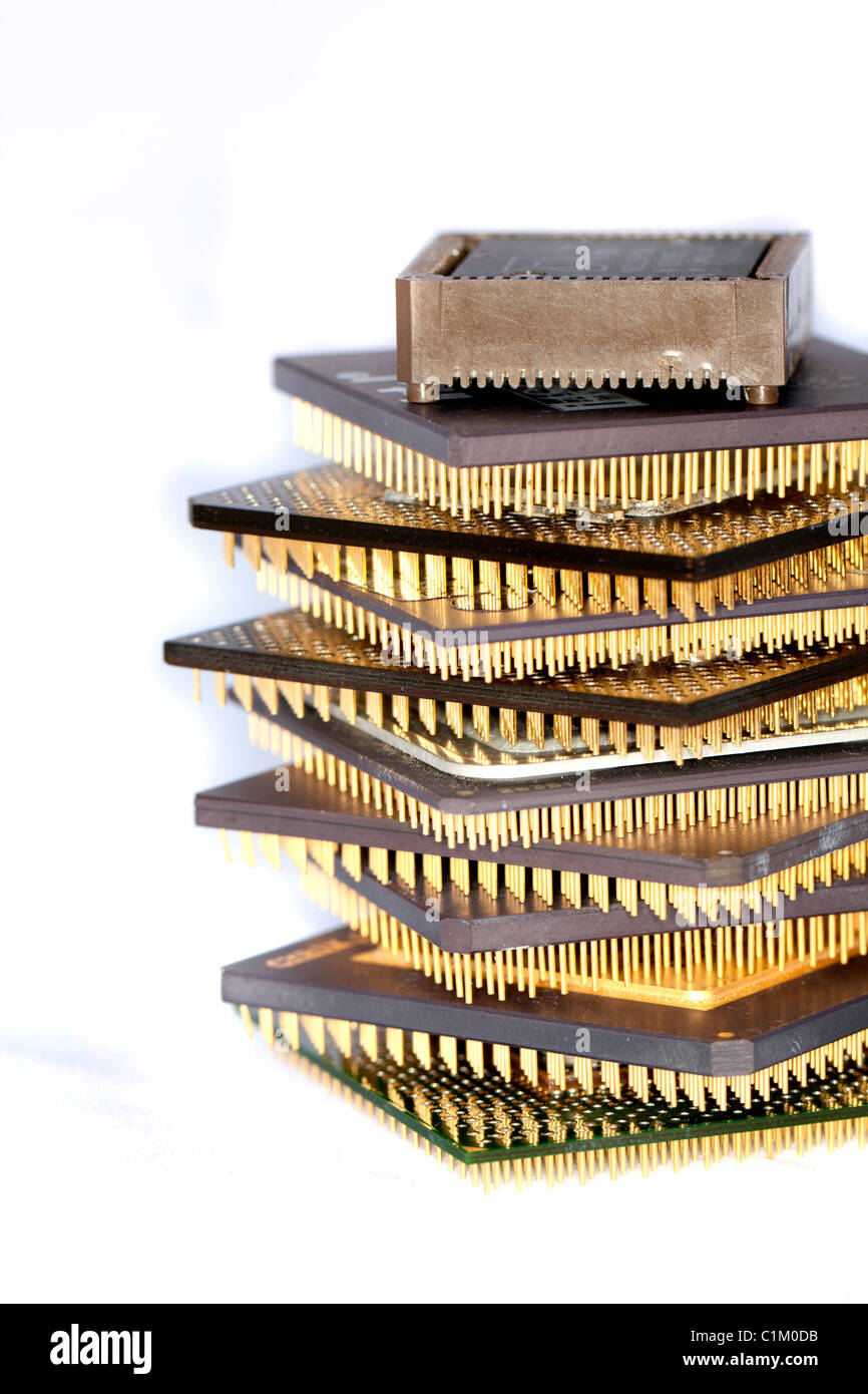 Close view detail of some computer microprocessors isolated on a white background Stock Photo ...