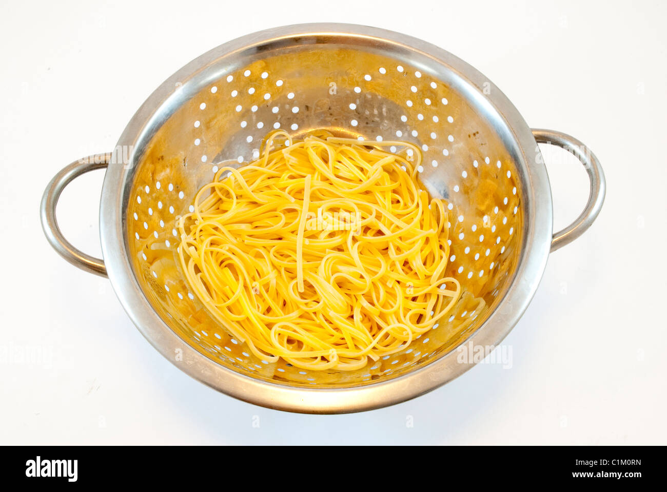 Noodles strainer hi-res stock photography and images - Alamy