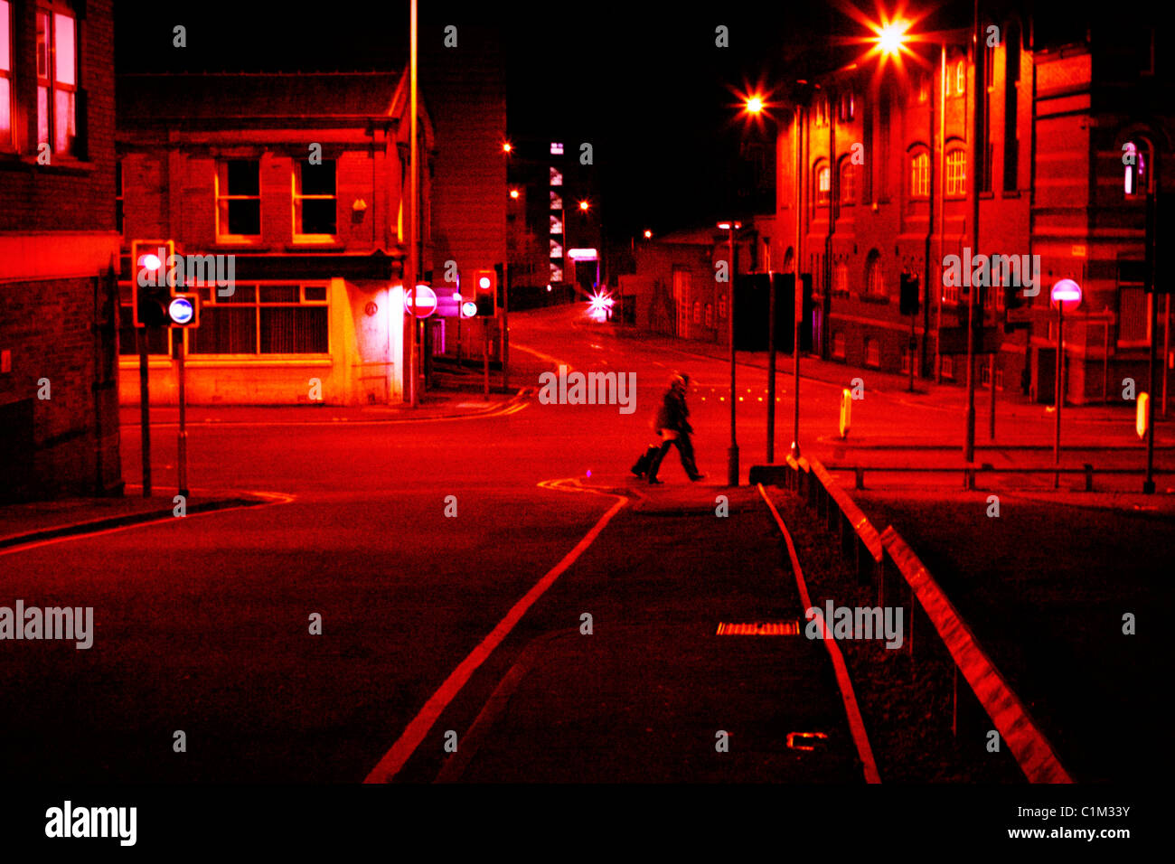 Two women walking alone at night in city Stock Photo - Alamy