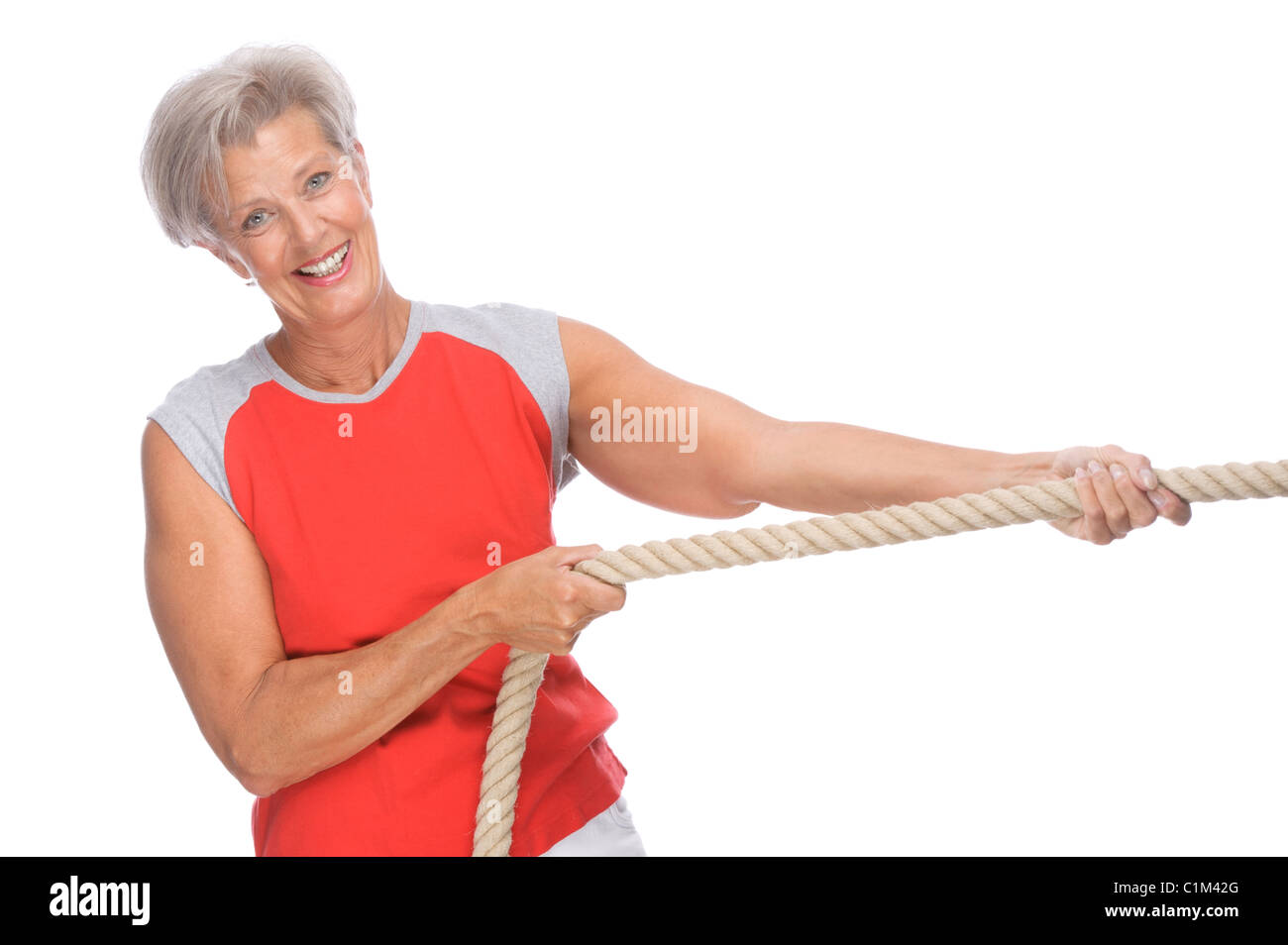 Full isolated studio portrait of a active senior woman Stock Photo - Alamy