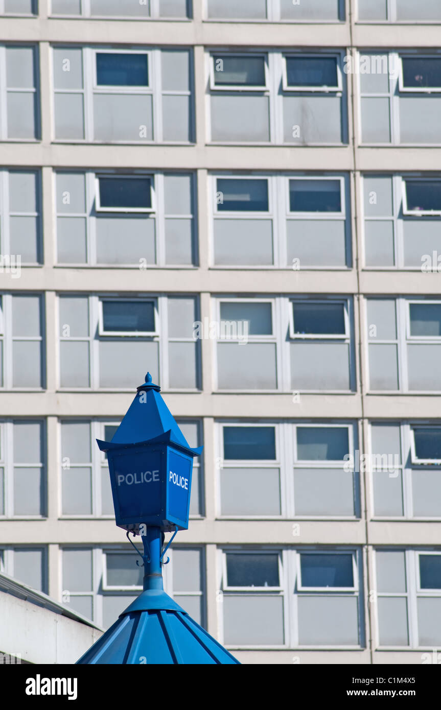 Police sign, Pendleton Police Station, against a backdrop of a block of ...