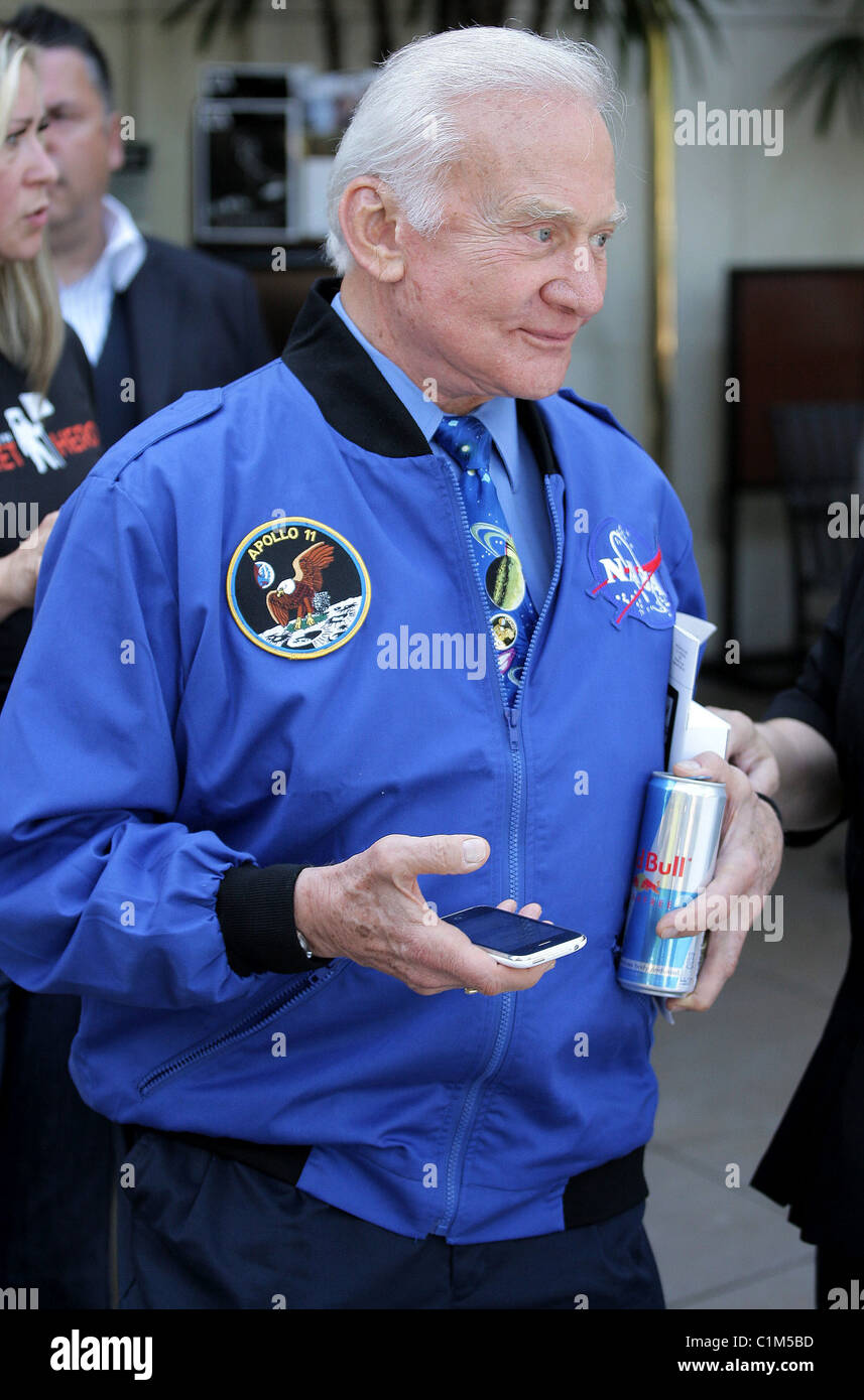 Buzz Aldrin out and about with a can of Red Bull energy drink and an ...