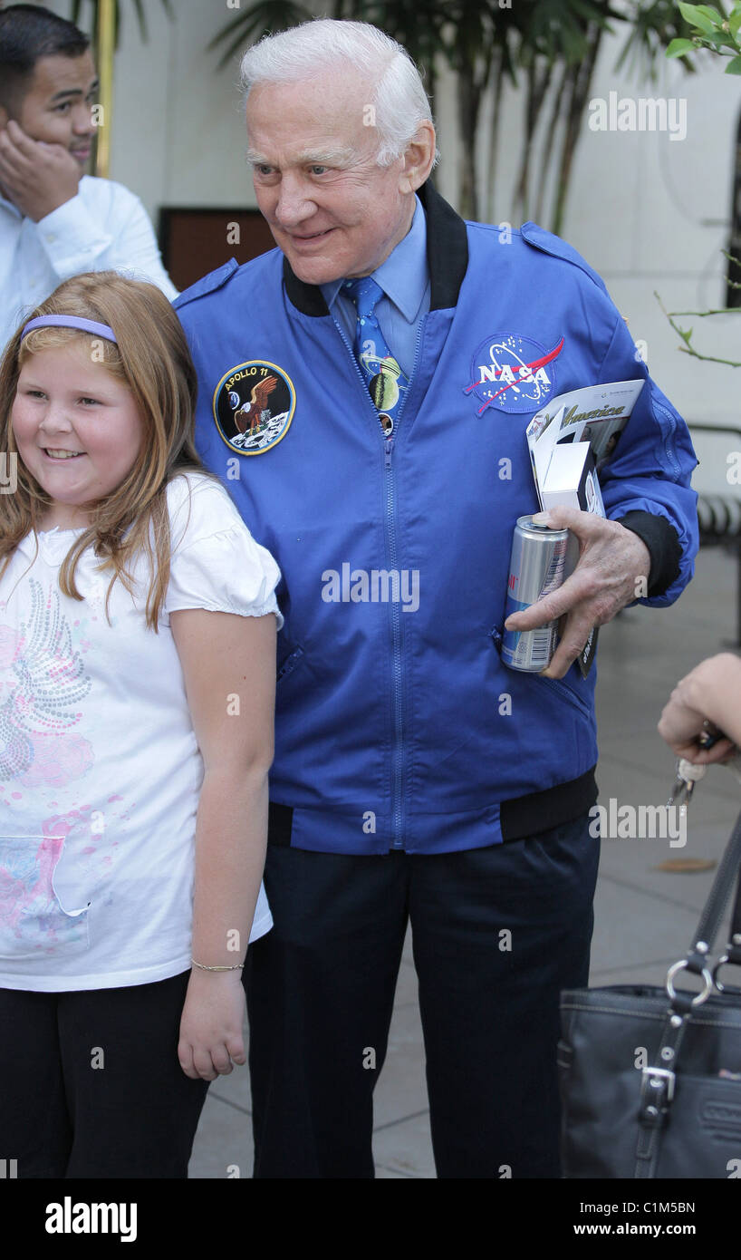 Buzz Aldrin out and about with a can of Red Bull energy drink and an ...