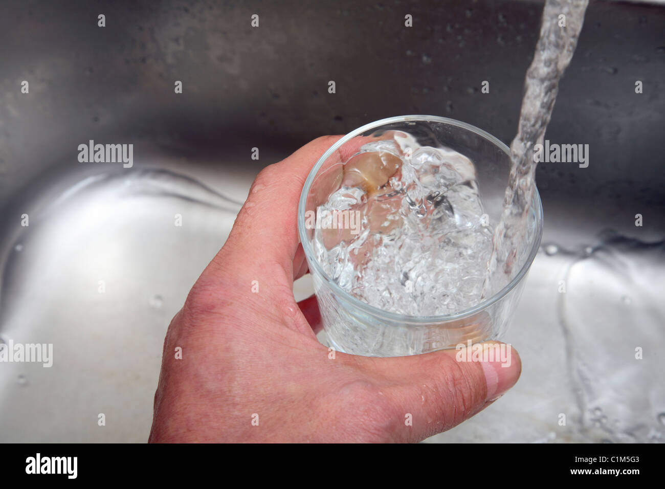 Filling glass water from sink hi-res stock photography and images - Alamy