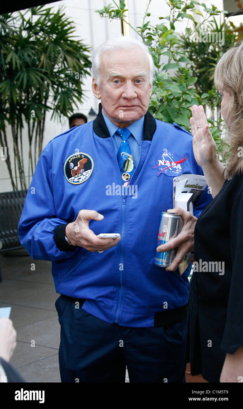 Buzz Aldrin out and about with a can of Red Bull energy drink and an ...