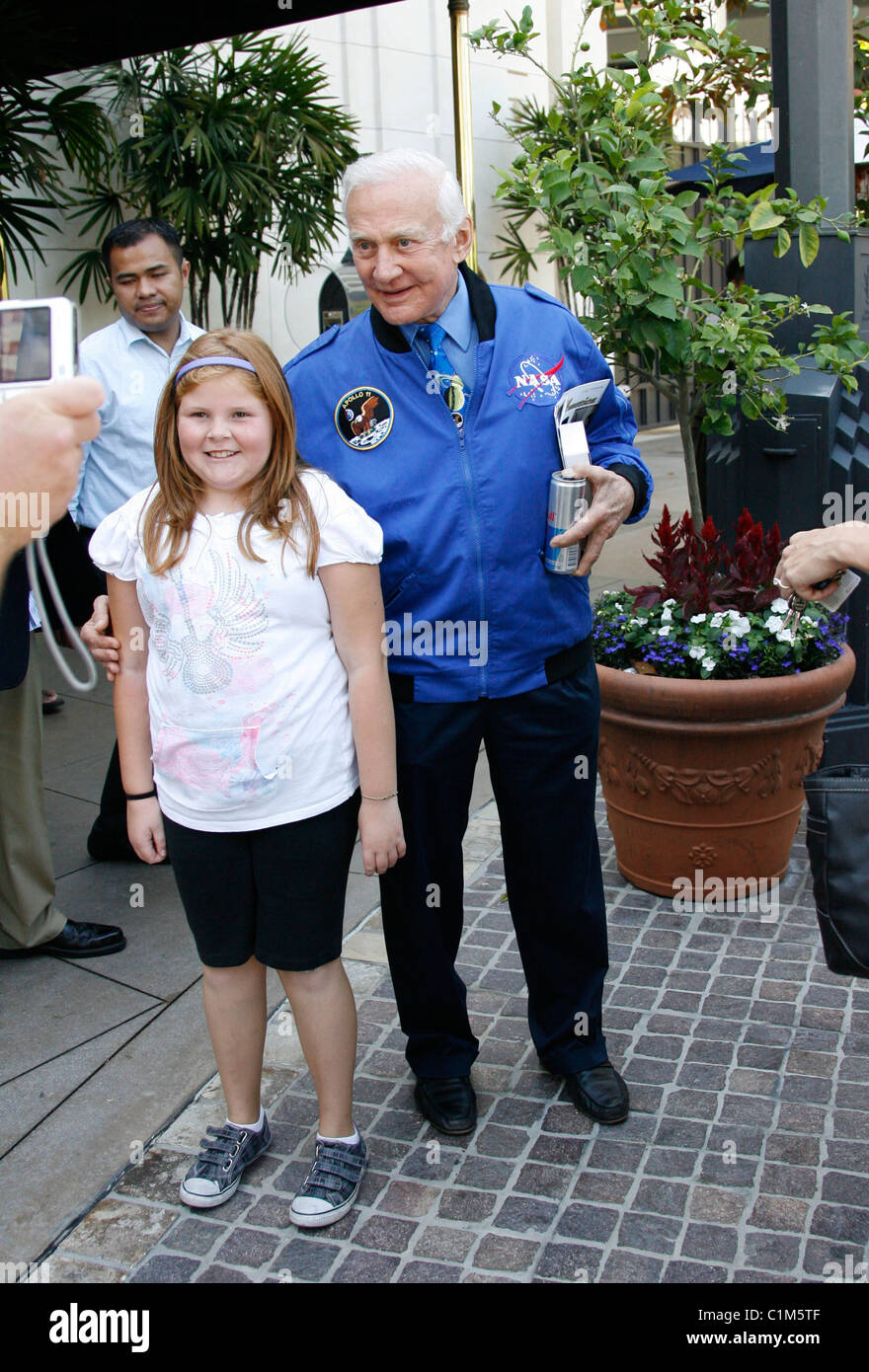 Buzz Aldrin out and about with a can of Red Bull energy drink and an ...