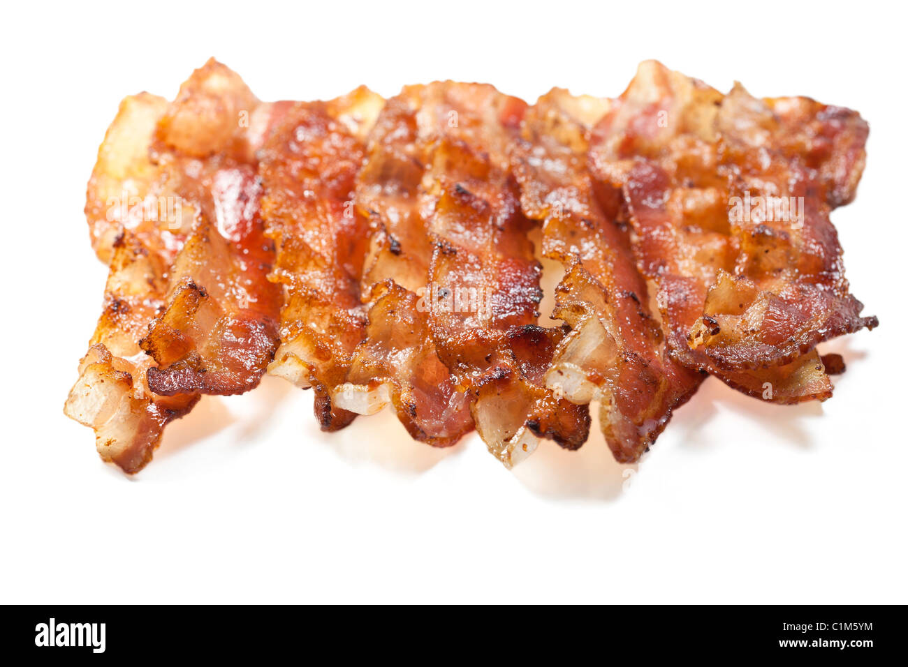 Cooked bacon isolated on white background. Charles Lupica Stock Photo ...