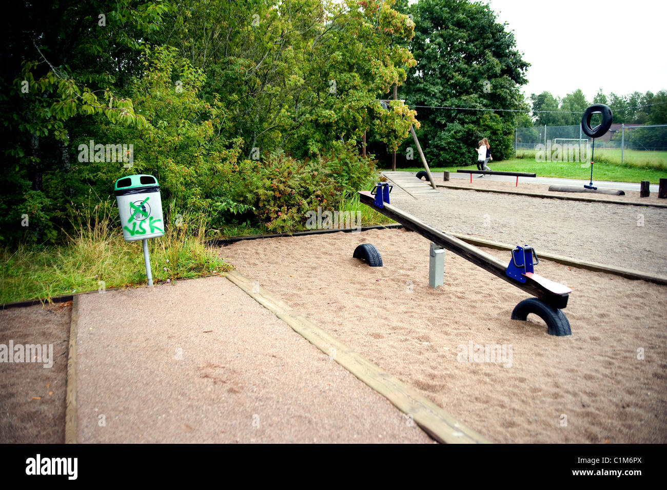 trash bin, waste basket, playground, graffitti Stock Photo - Alamy